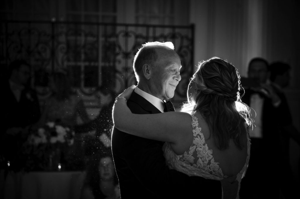 A bride and groom sharing their first dance at their New York wedding ...