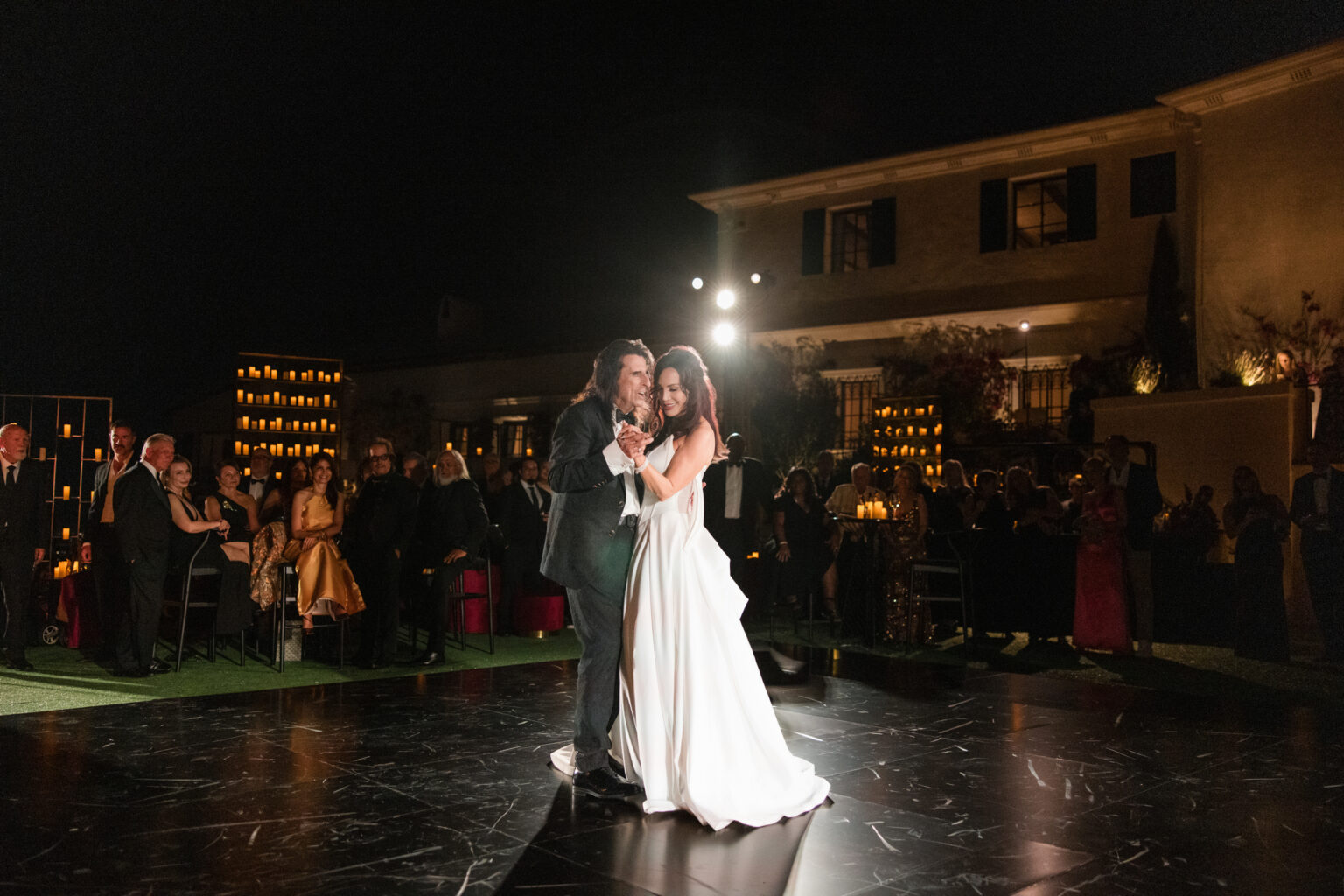 A bride anAlice and Sheryl Cooper share their first dance at their ...